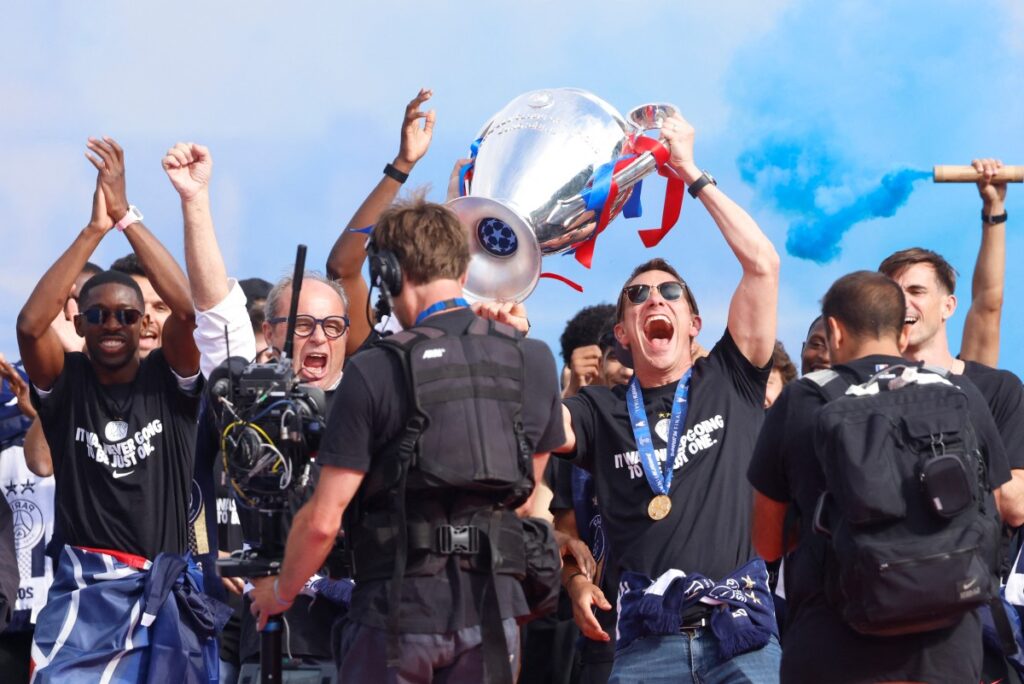 Paris Saint-Germain players celebrate amid riot recriminations